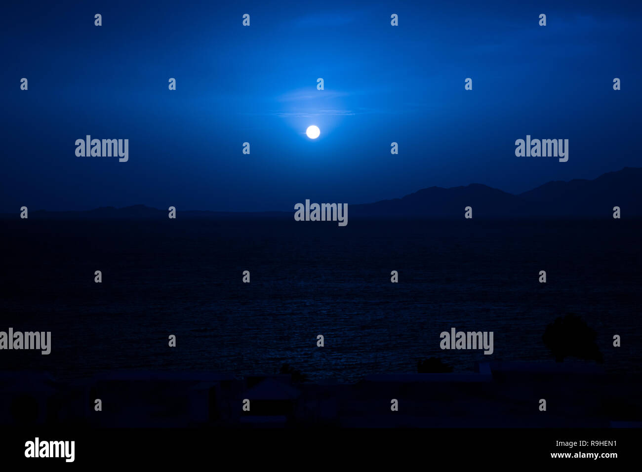 a breathtaking Arab sunset, dawn on the sea. beautiful embankment at ...