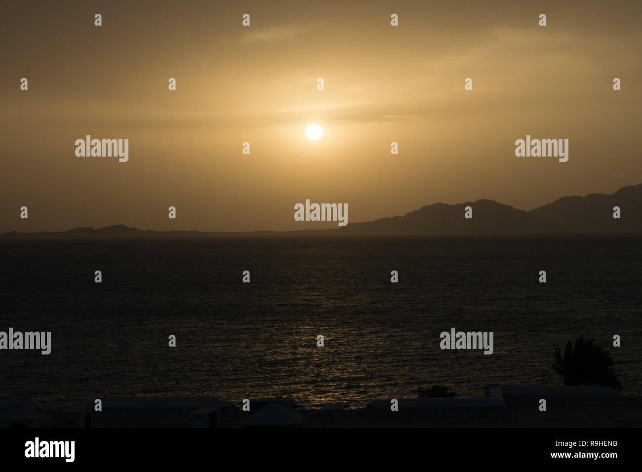 a breathtaking Arab sunset, dawn on the sea. beautiful embankment at ...