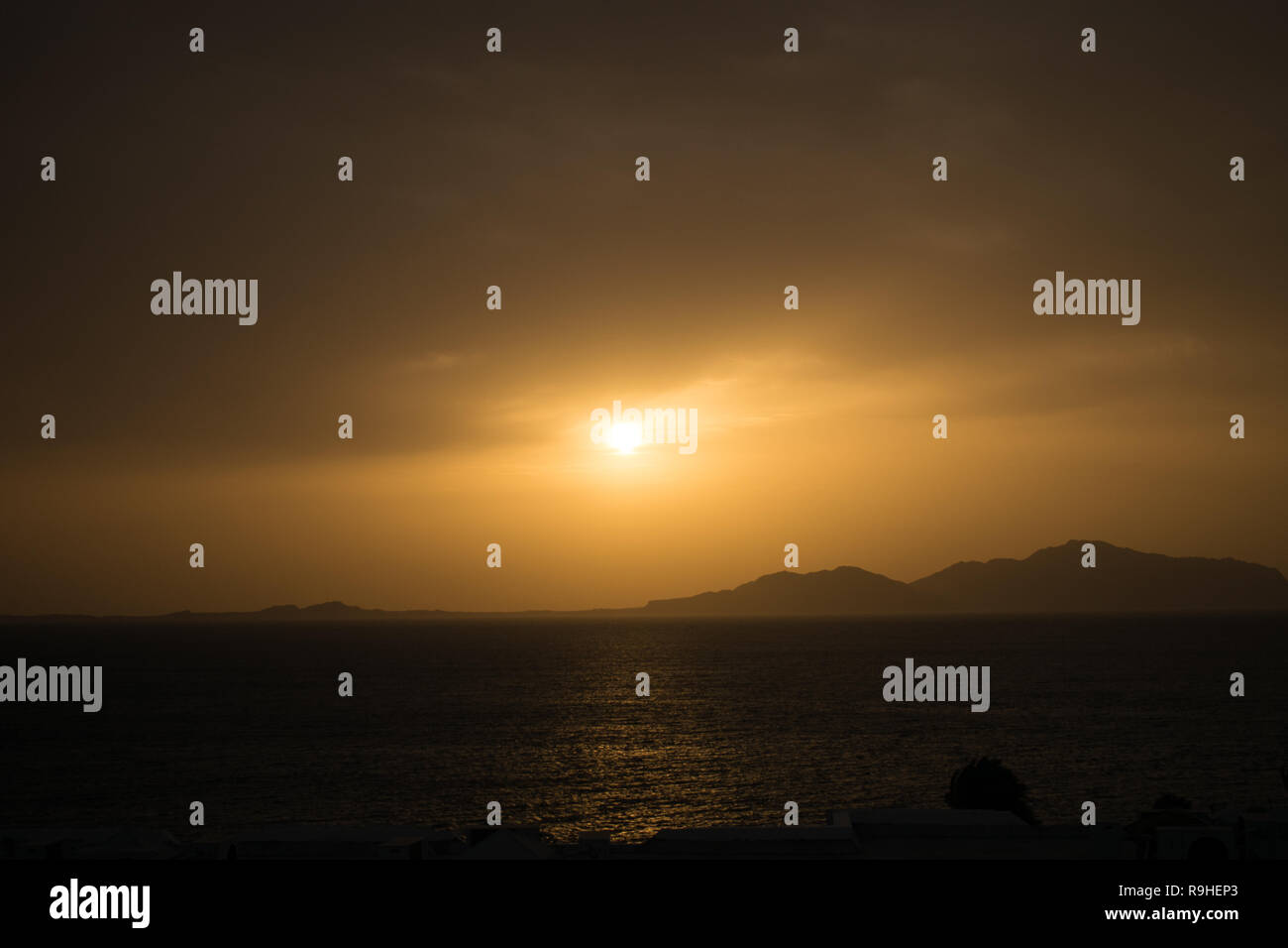 a breathtaking Arab sunset, dawn on the sea. beautiful embankment at ...