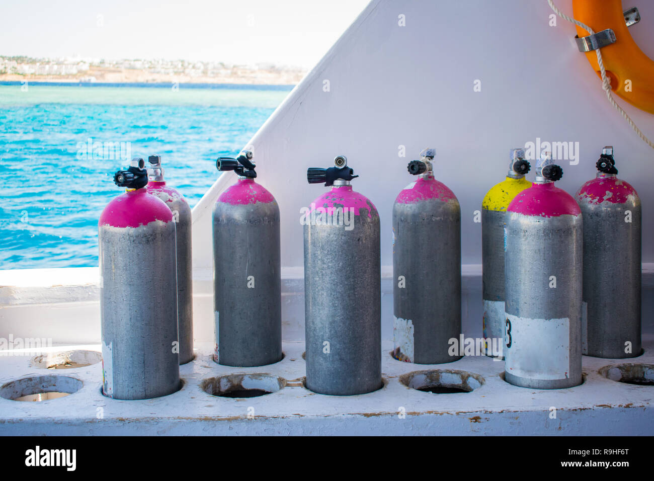 equipment for diving. a row of balloons on a yacht against the ...