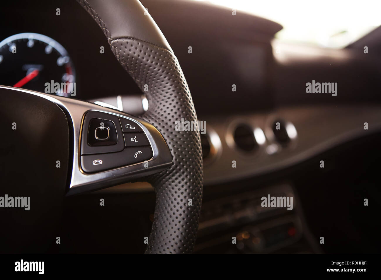 Control buttons on the steering wheel of a car Stock Photo - Alamy