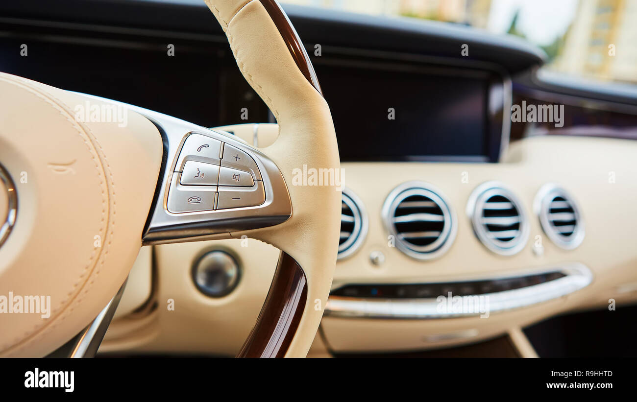 Control buttons on the steering wheel of a car Stock Photo - Alamy