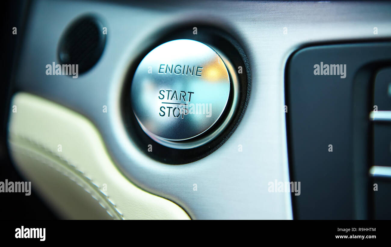 Start stop engine modern new car button Stock Photo - Alamy