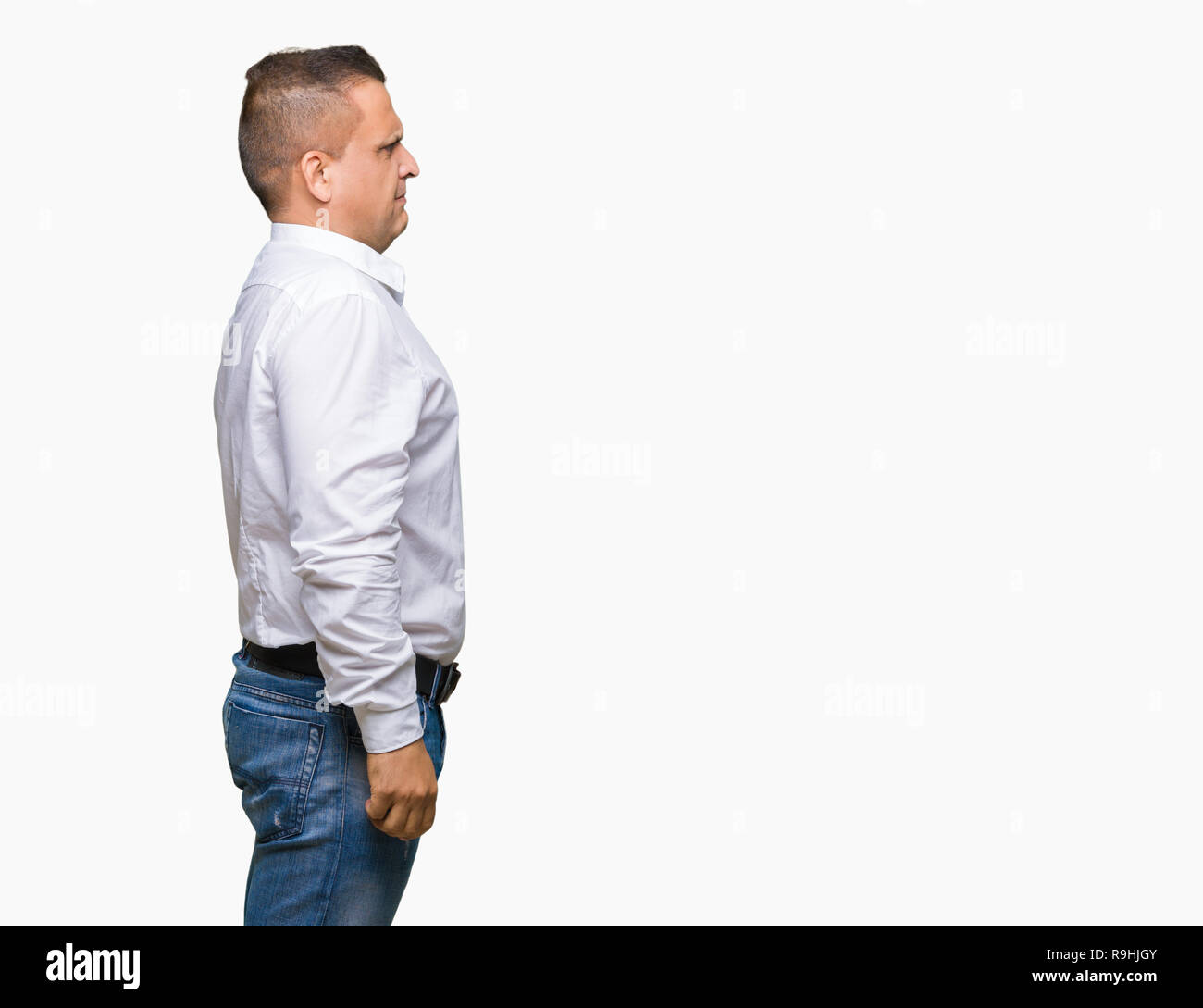 Middle age arab elegant man over isolated background looking to side ...