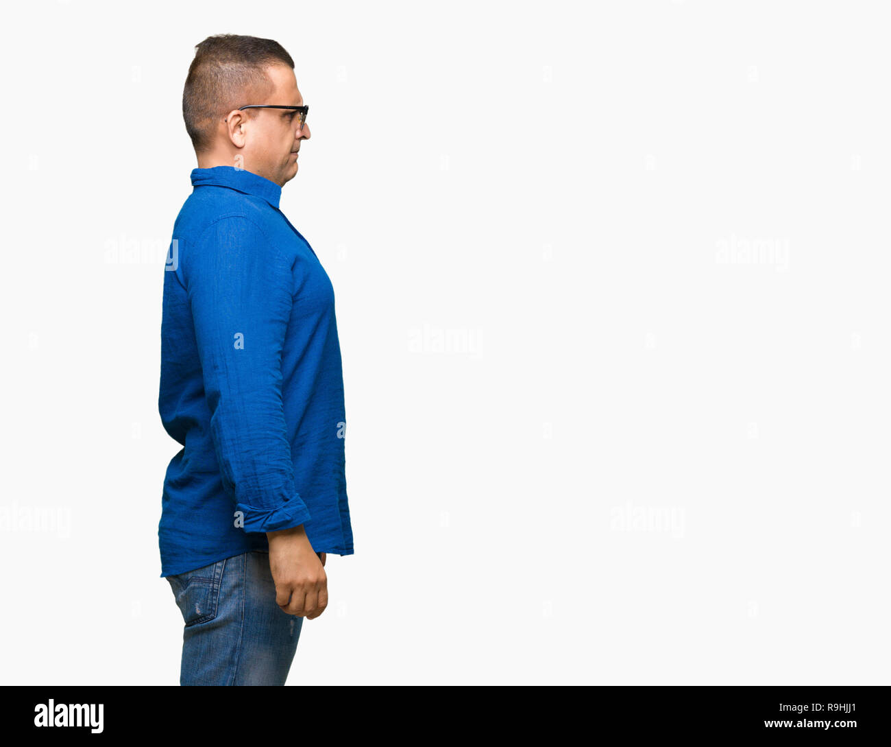 Middle age arab man wearing sunglasses over isolated background looking ...