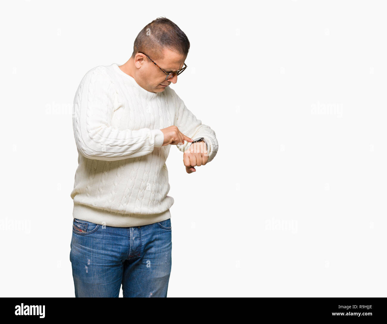 Old man checking wrist watch Cut Out Stock Images & Pictures - Alamy