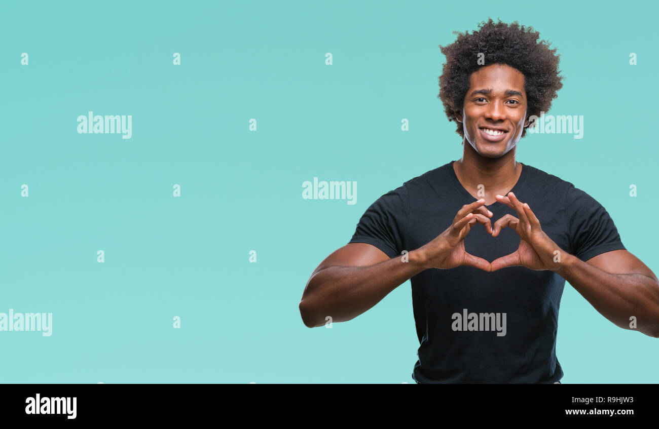 Afro american man over isolated background smiling in love showing ...