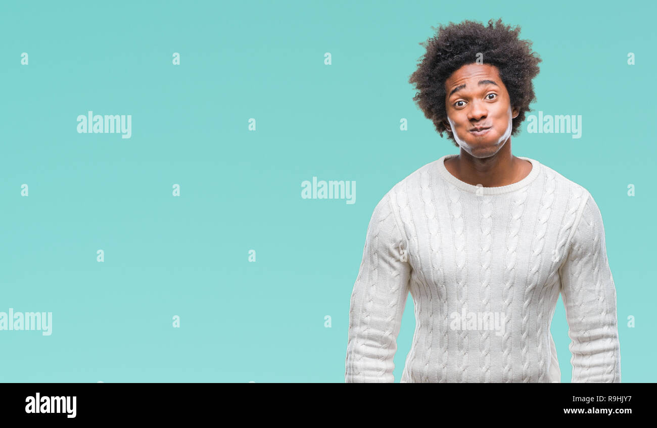 Afro american man over isolated background puffing cheeks with funny ...