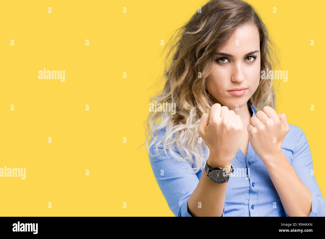 Beautiful young blonde business woman over isolated background Ready to ... Beautiful young blonde business woman over isolated background Ready to ...