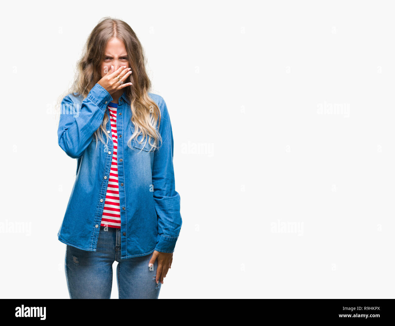 Beautiful Young Blonde Woman Over Isolated Background Smelling