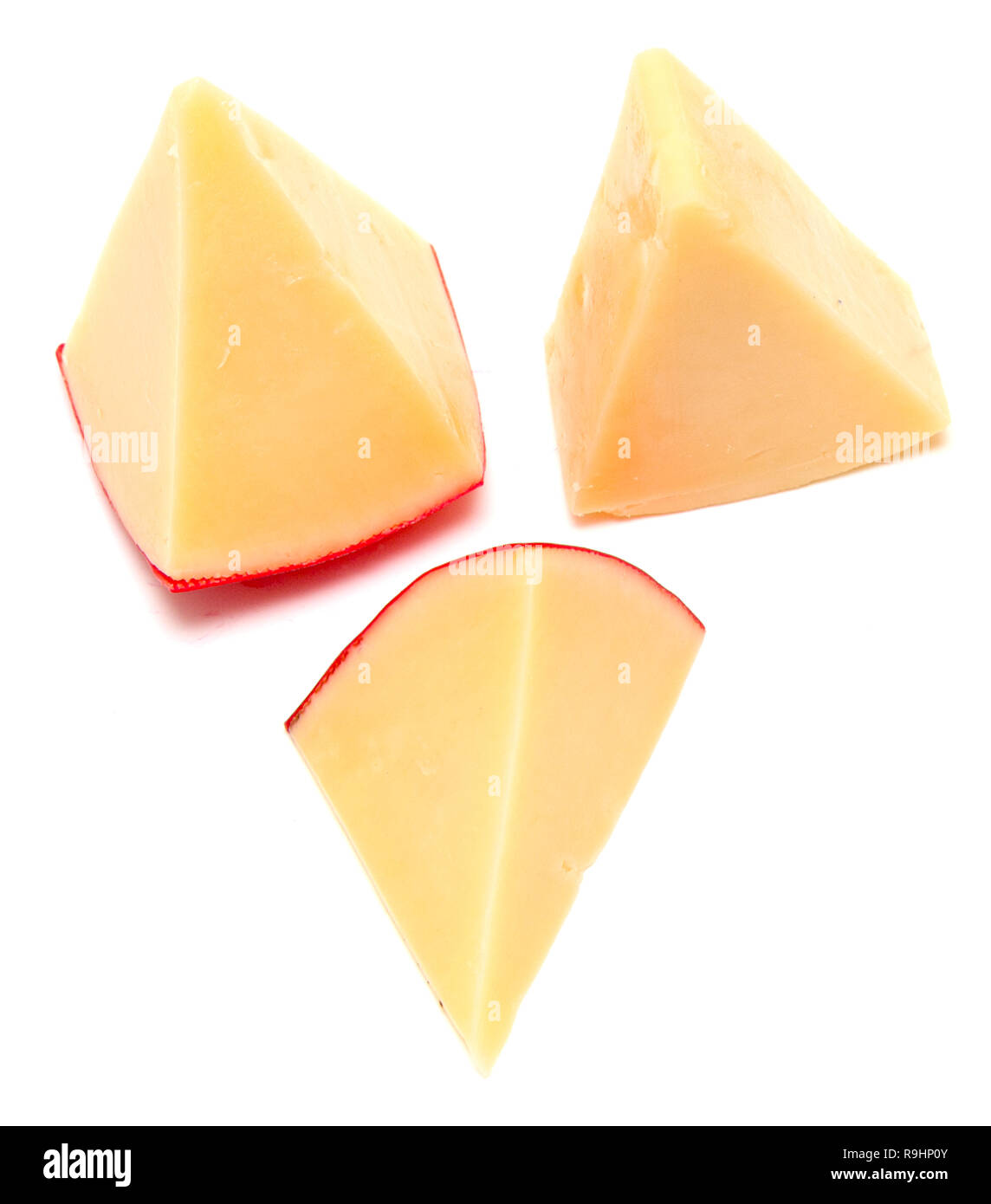 Pieces of cheese isolated on white background Stock Photo - Alamy