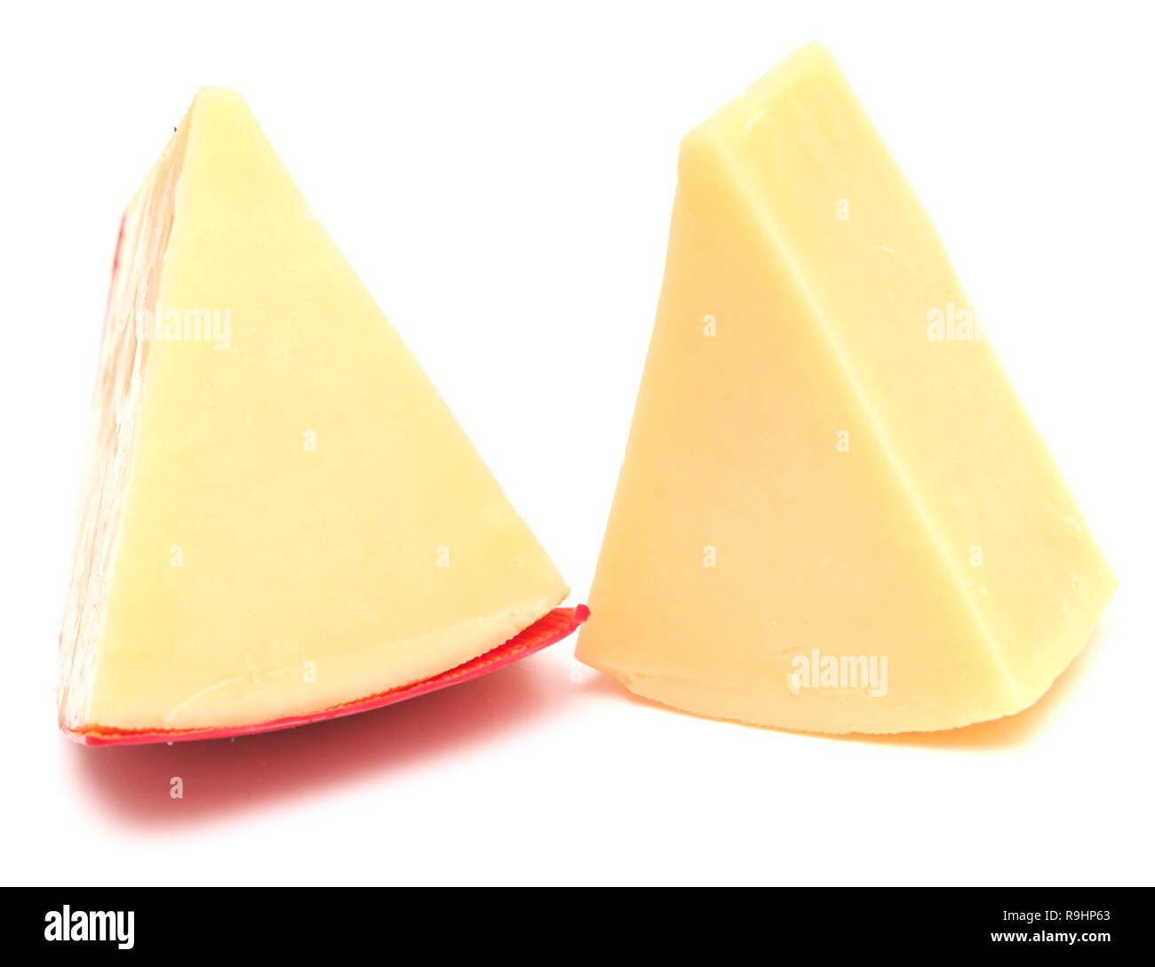 Two pieces of cheese isolated on white background Stock Photo - Alamy