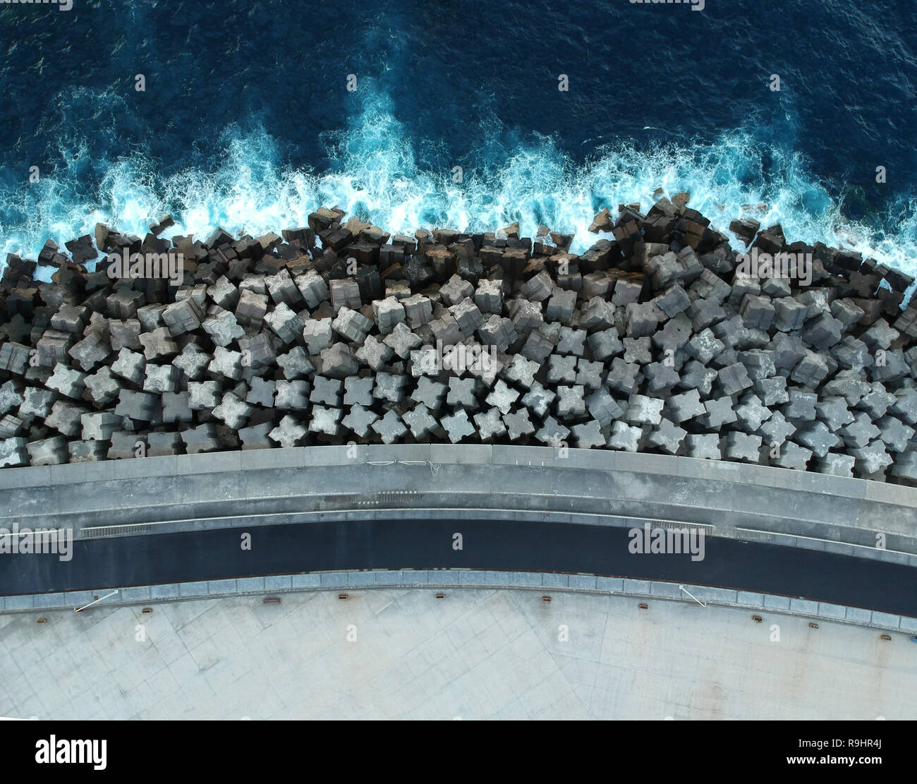 Concrete breakwaters. Seascape with concrete tetrapodes to protect ...