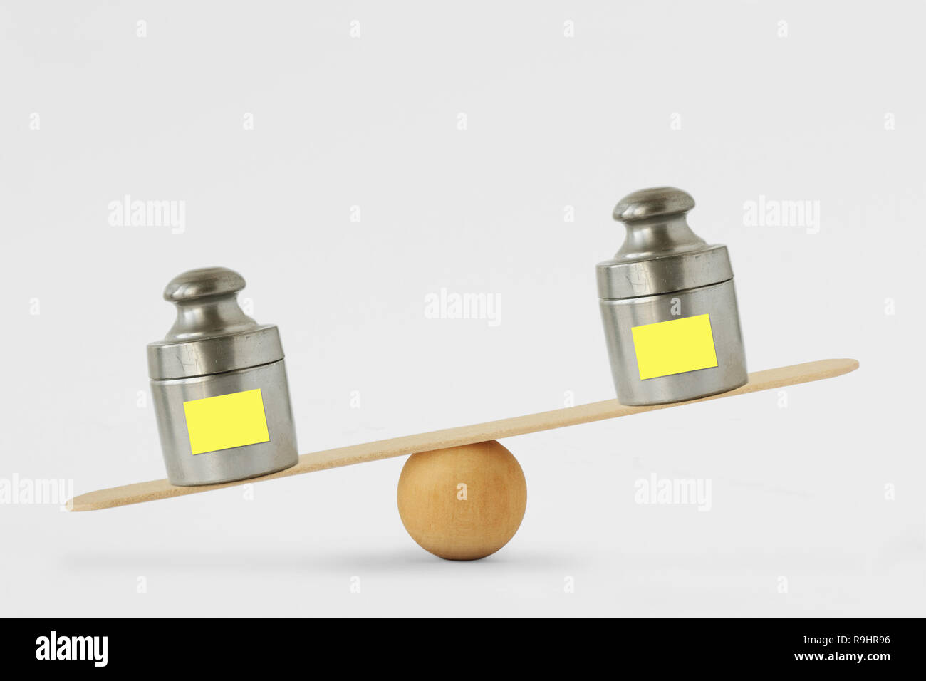 Imbalanced scale weight hi-res stock photography and images - Alamy