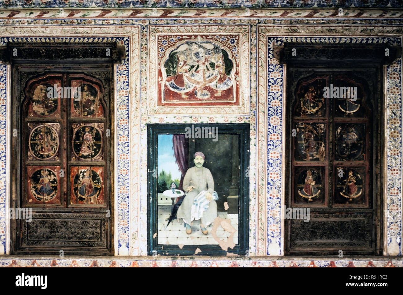 painted doors, frescoes and photography on the wall of the Kanhaiyalai ...