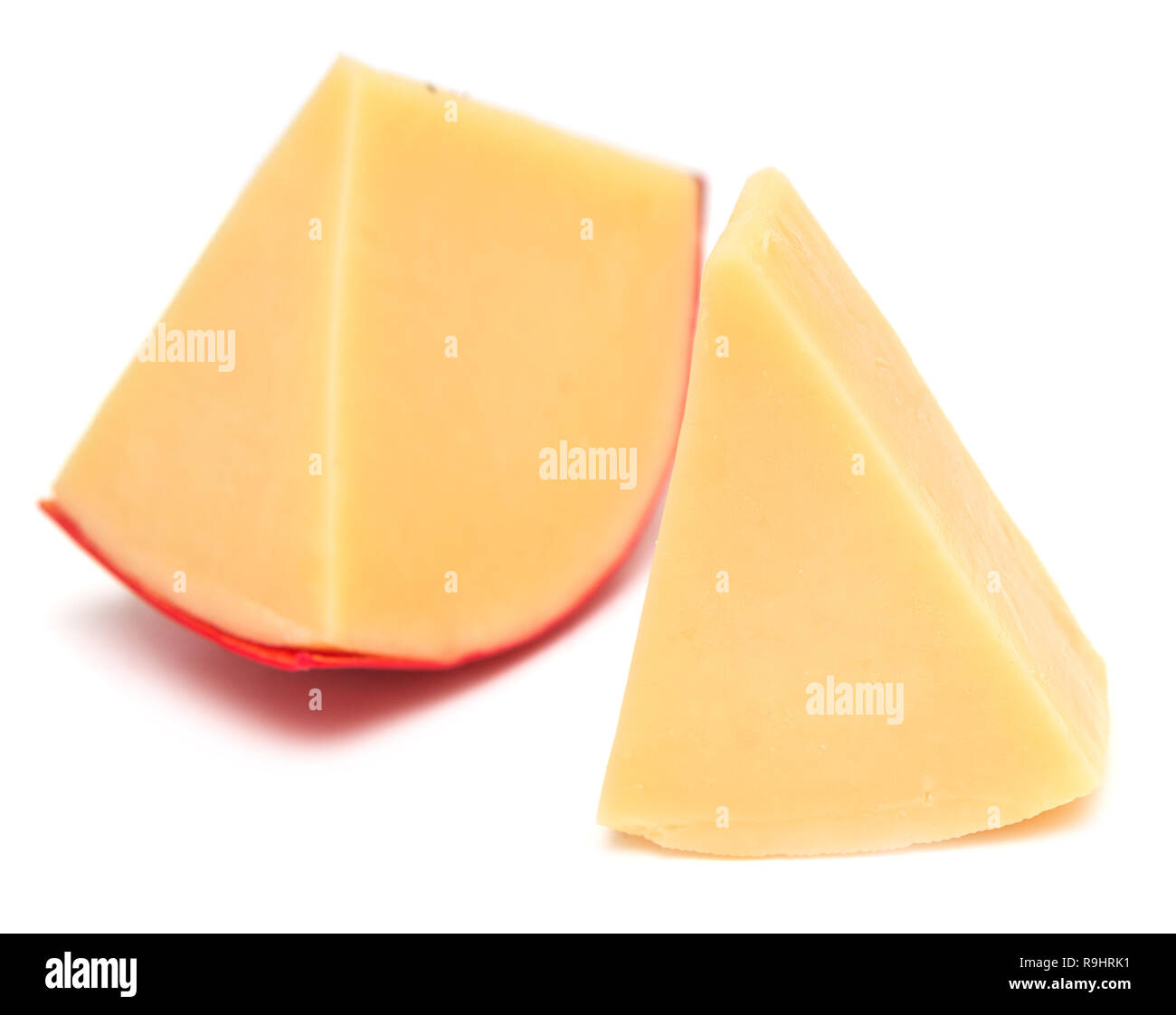Two pieces of cheese isolated on white background Stock Photo - Alamy