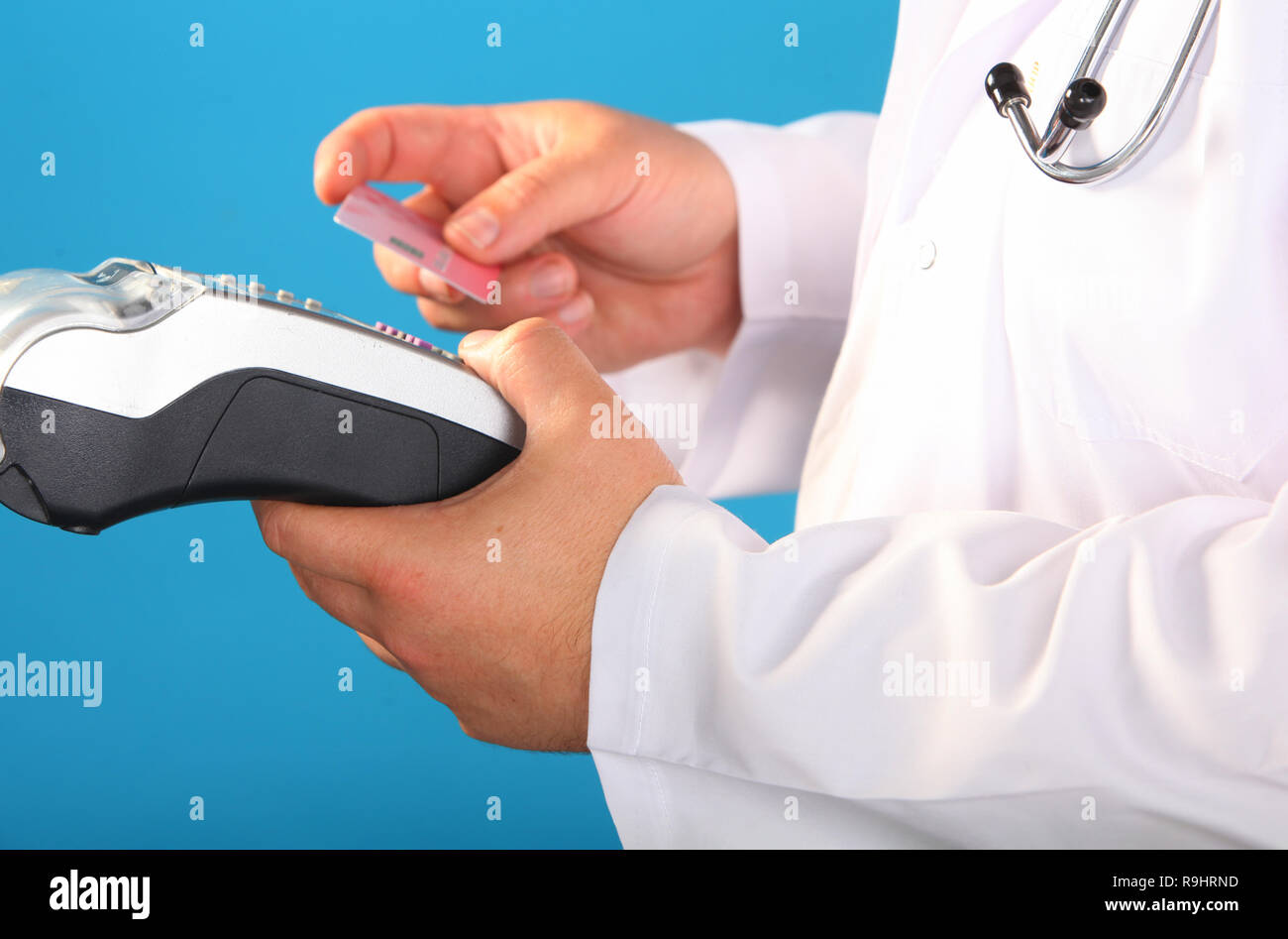 Shopping in pharmacy. Pharmacist holding security device for customer ...