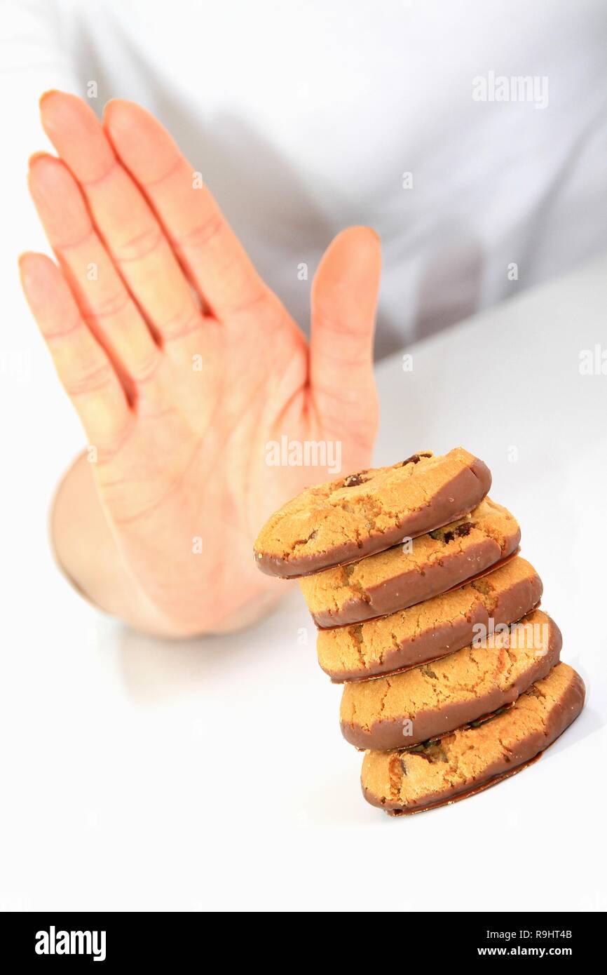 hand gesture saying stop unhealthy eating chocolate cookies stock photo ...