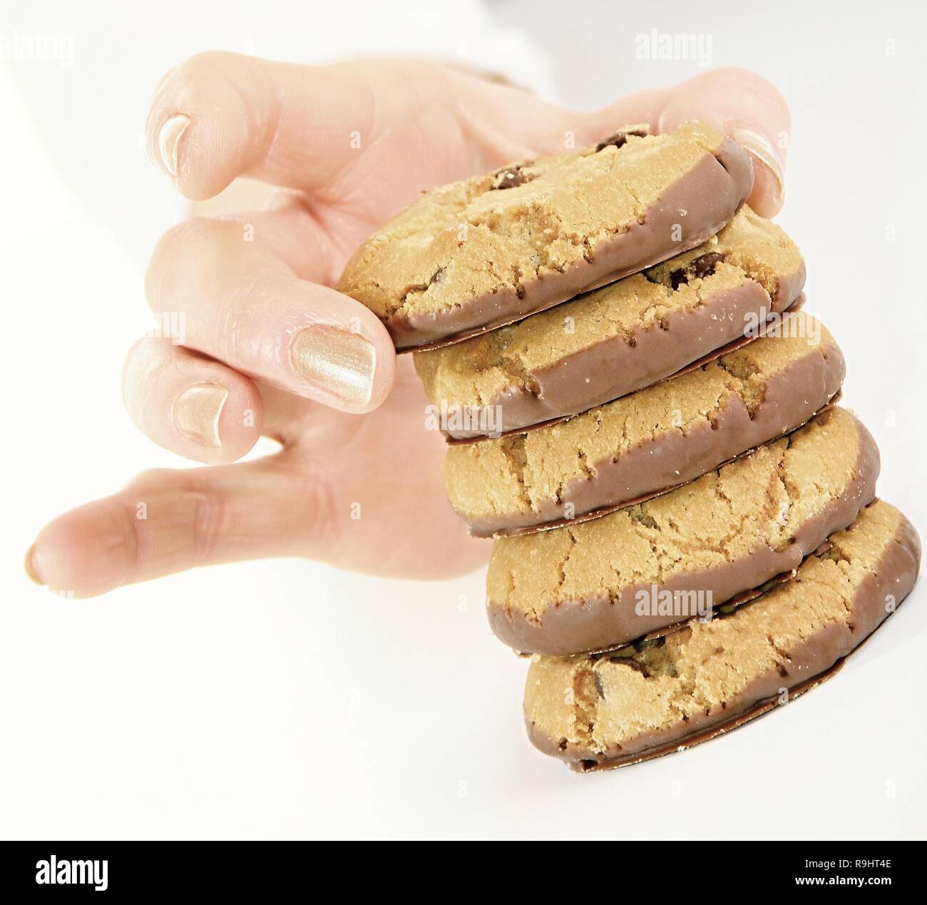 hand gesture saying stop unhealthy eating chocolate cookies stock photo ...