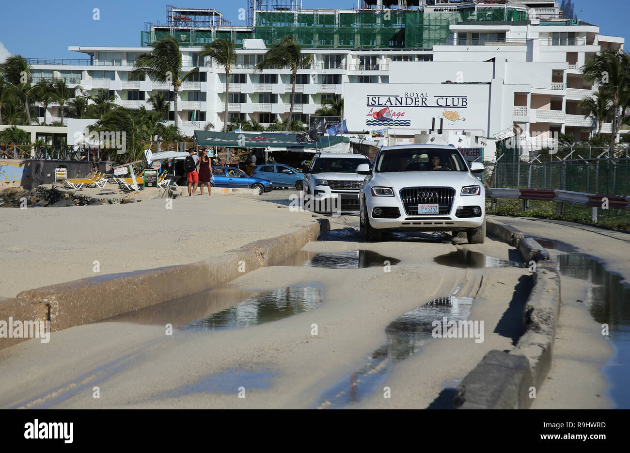 The famous Maho Beach in Sint Maarten, after large waves have covered ...