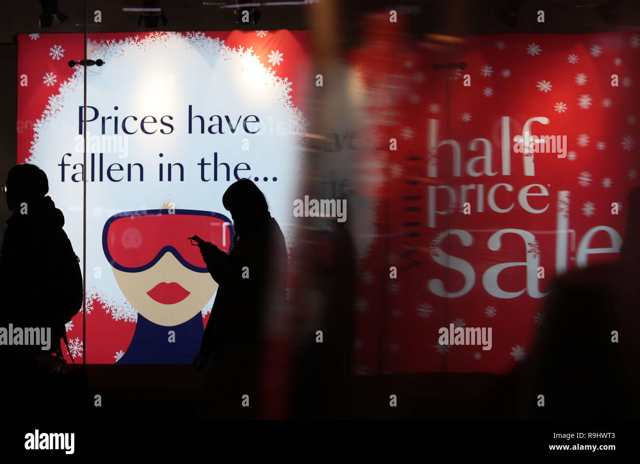 A half-price shop sale sign on Oxford Street, central London Stock ...