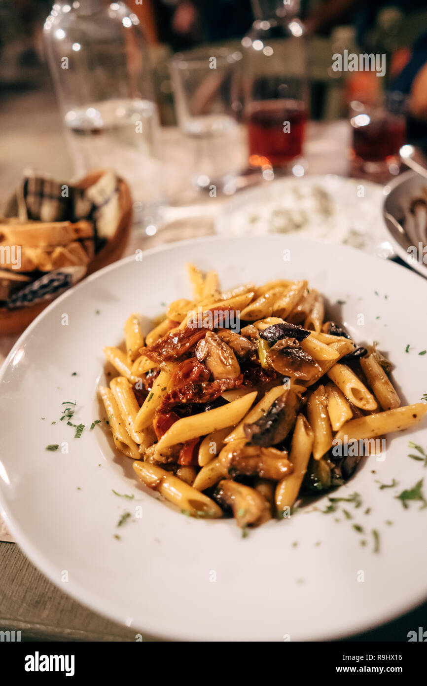 Pasta seashells with minced meat on the table Stock Photo - Alamy