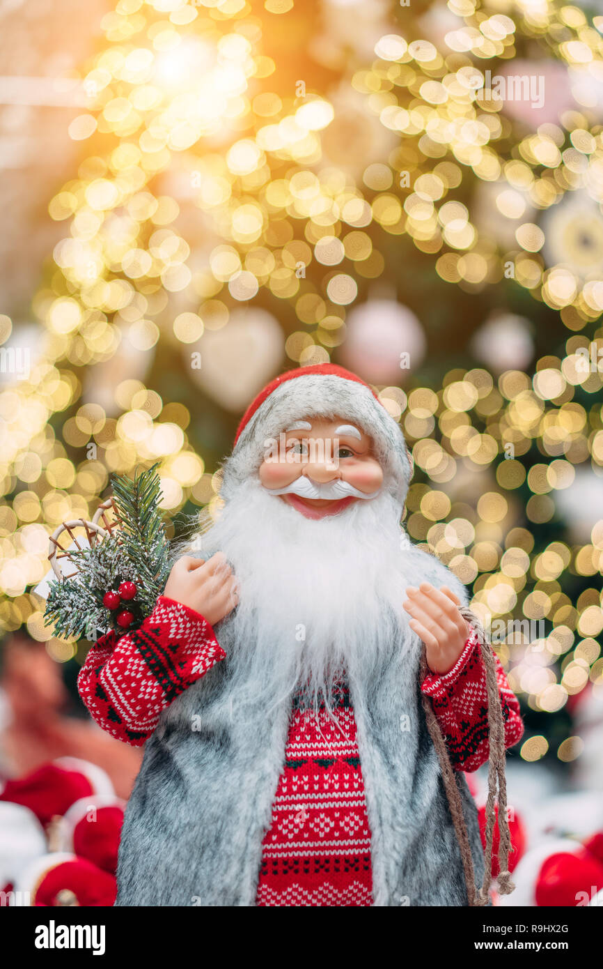 Happy Santa on background of bokeh christmas tree Stock Photo - Alamy
