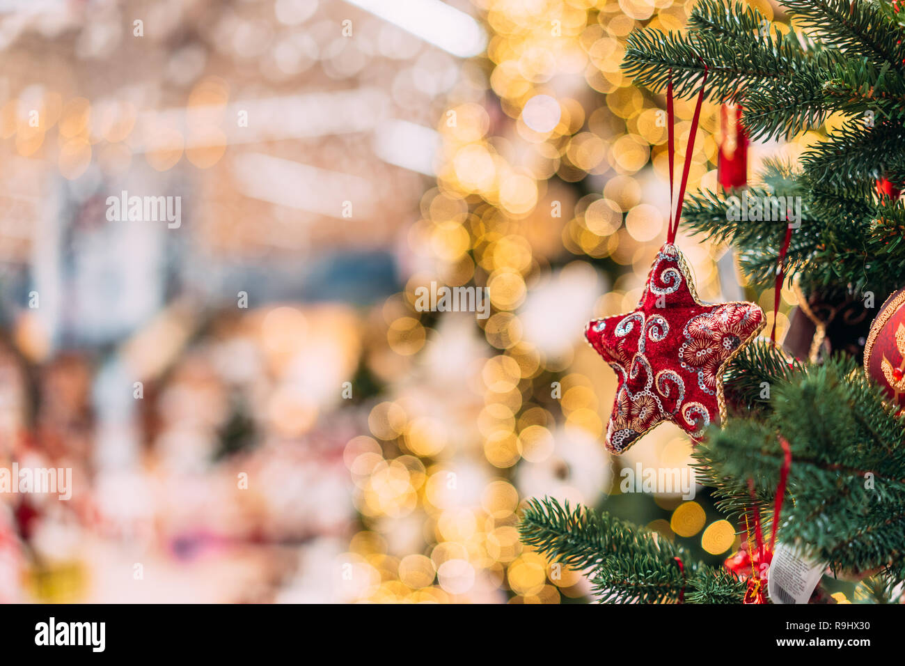 close up view of decorative toys on christmas tree Stock Photo - Alamy