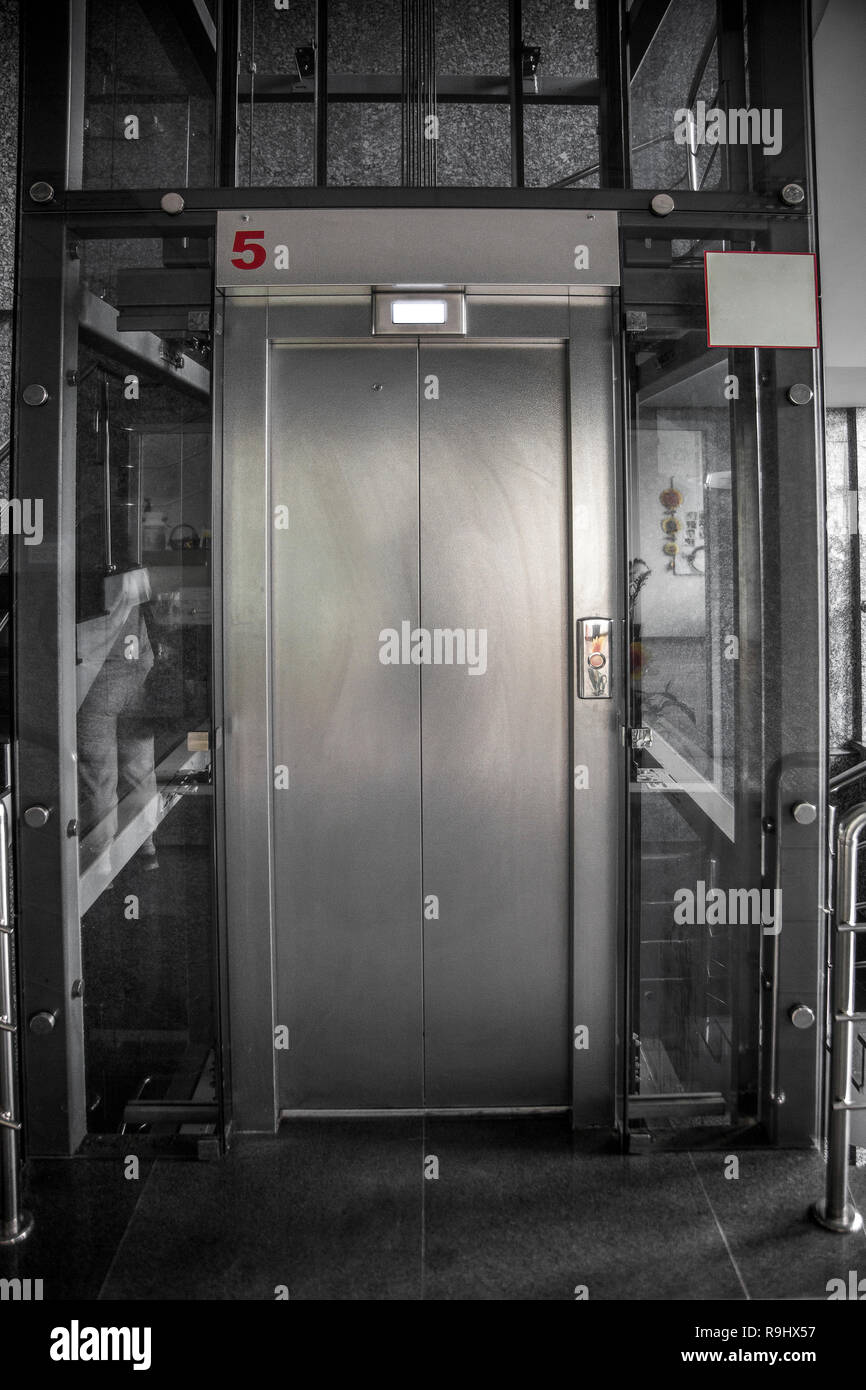 Closed lift doors hi-res stock photography and images - Alamy