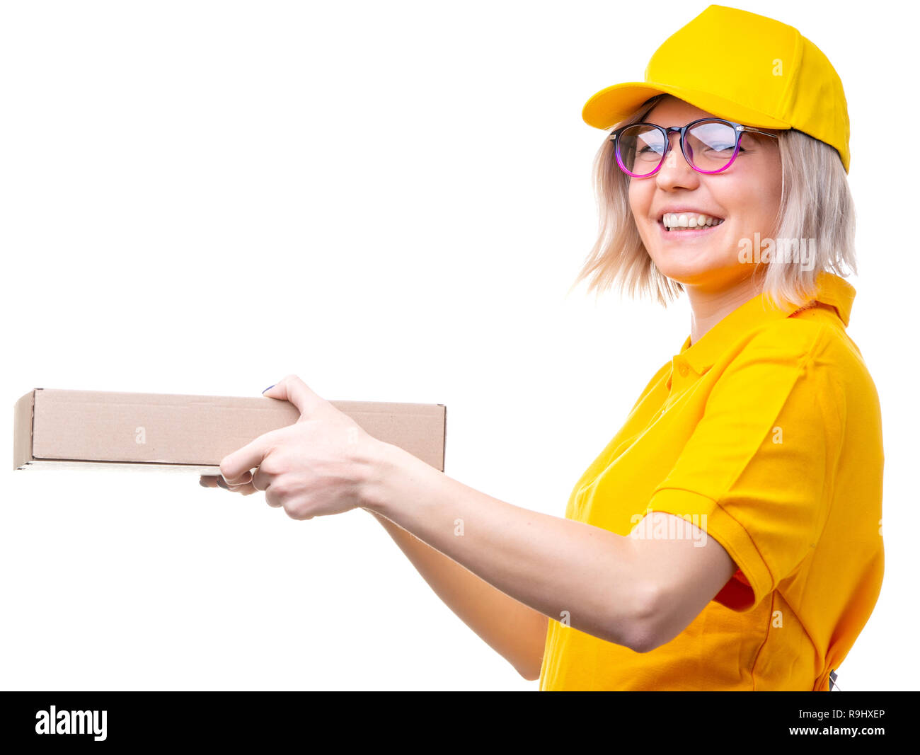 Photo on side of young blonde courier in yellow T-shirt on white clean ...