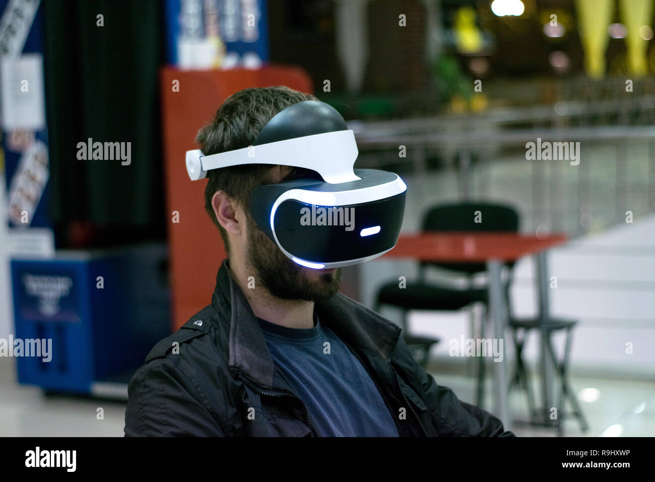 man in VR headset who enjoying game. Virtual reality. man in VR headset ...