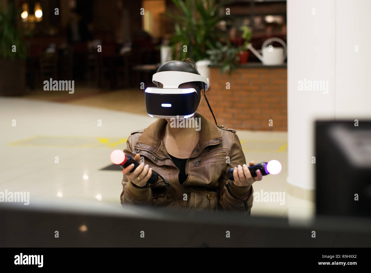 girl in VR headset who enjoying game. Virtual reality. teen in VR ...