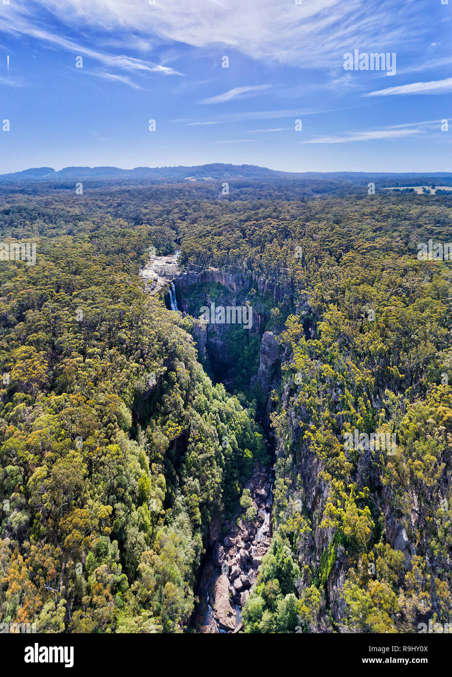 Deep creek eroded by Kangaroo river falling from flat plateau as ...