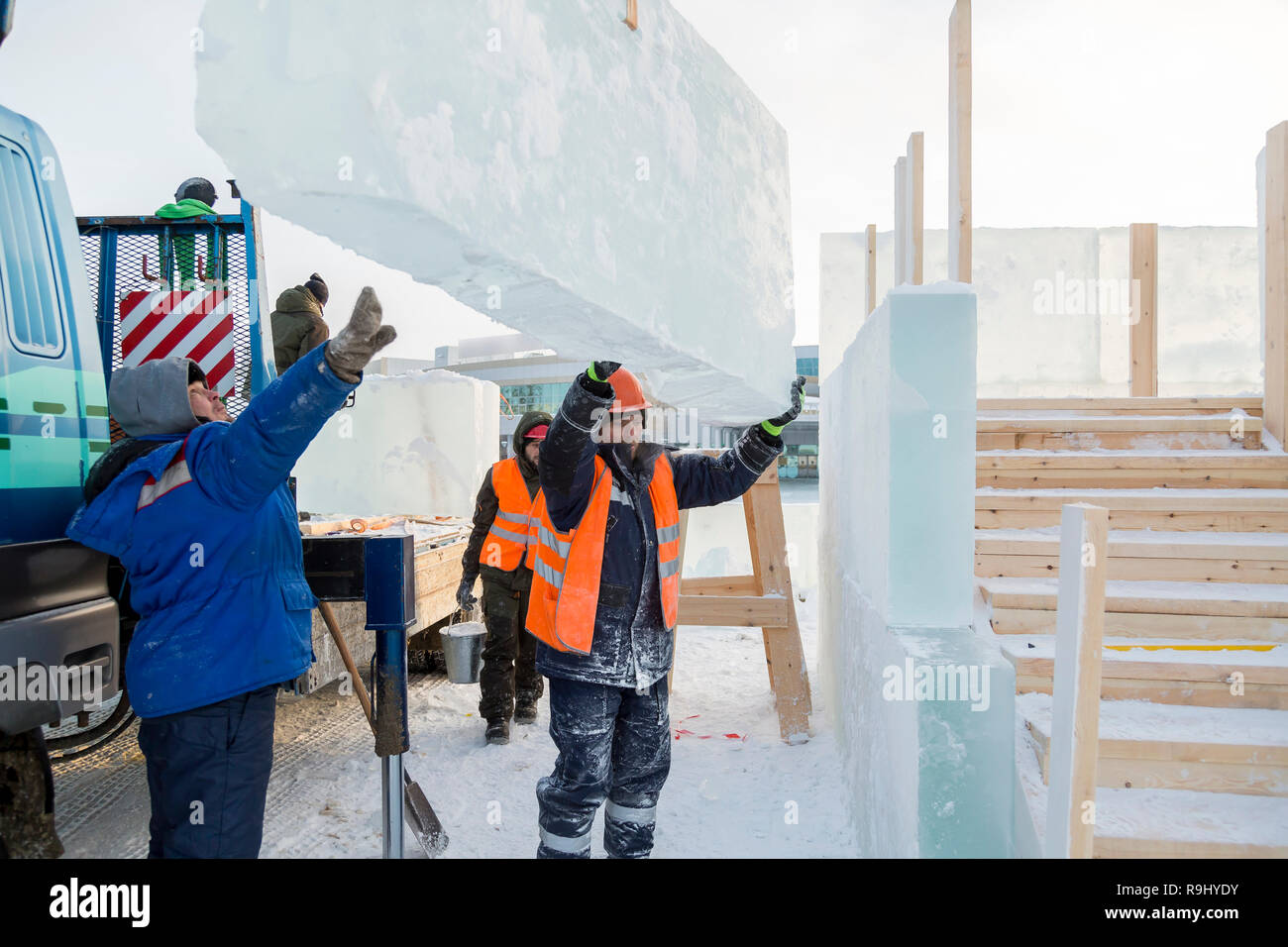 Installers are building an ice town of ice blocks Stock Photo - Alamy