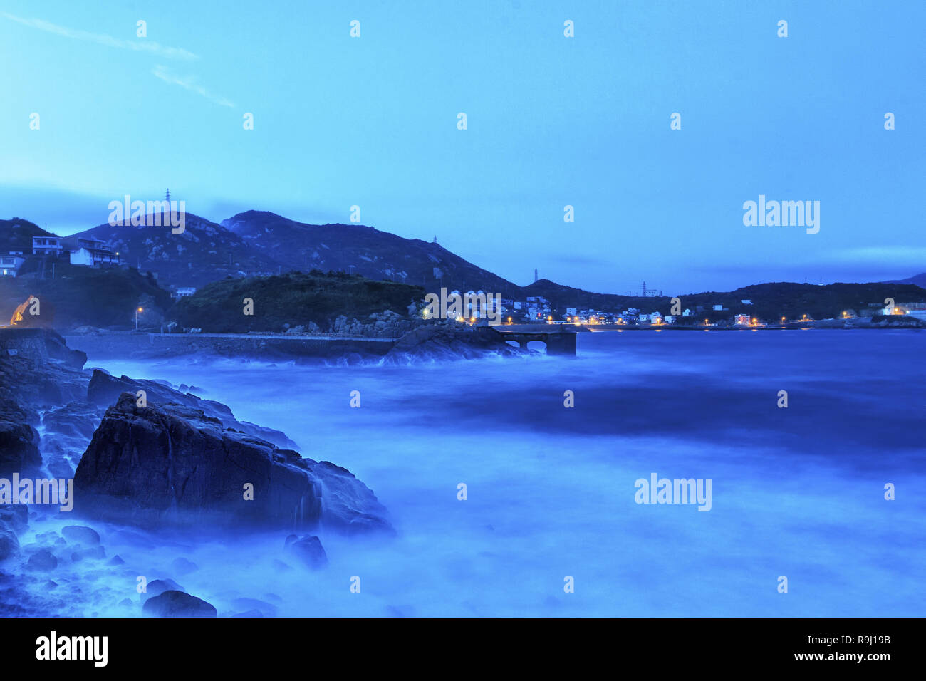 The sea at night Stock Photo - Alamy