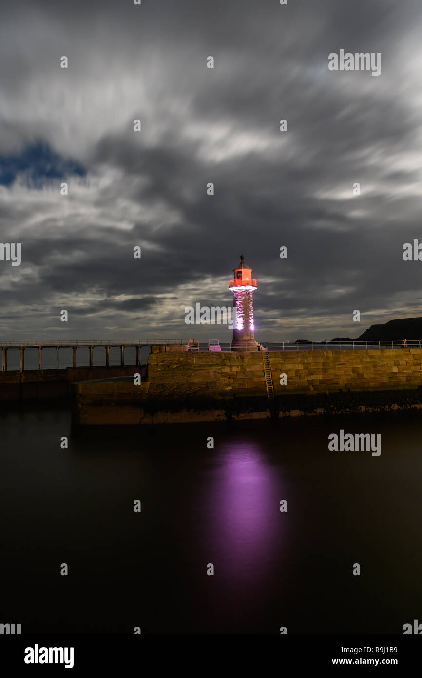 Whitby Lighthouse at night Stock Photo - Alamy