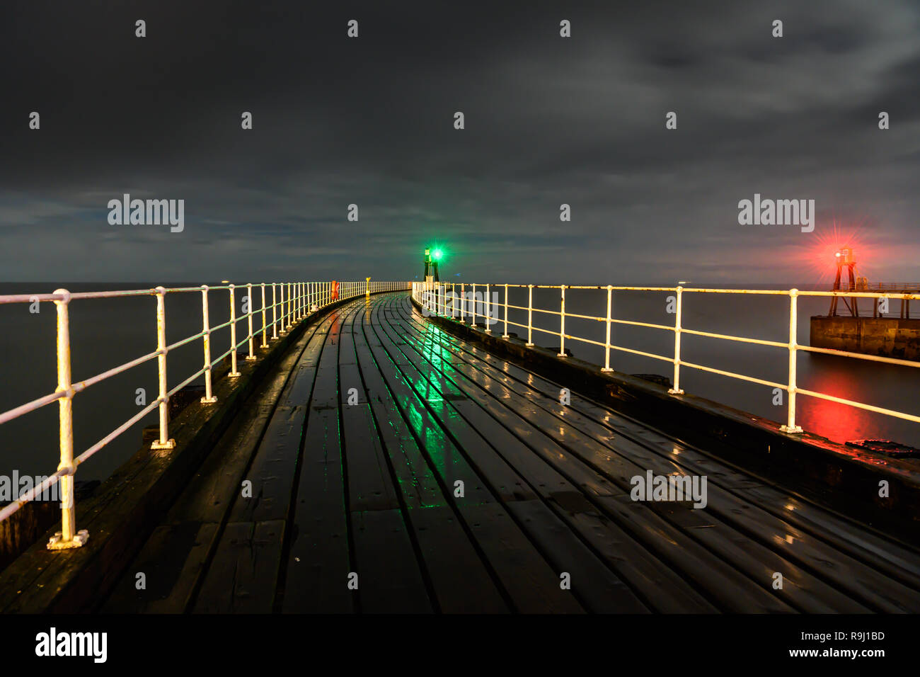 Whitby Lighthouse at night Stock Photo - Alamy
