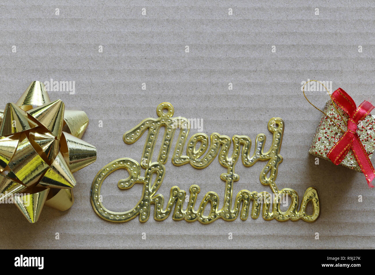 Christmas letters gold on brown cardboard and have copy space for ...