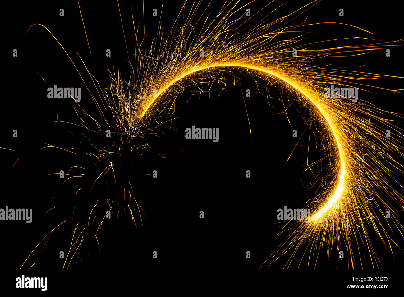 Abstract sparkler firework light on black background. Long exposure ...