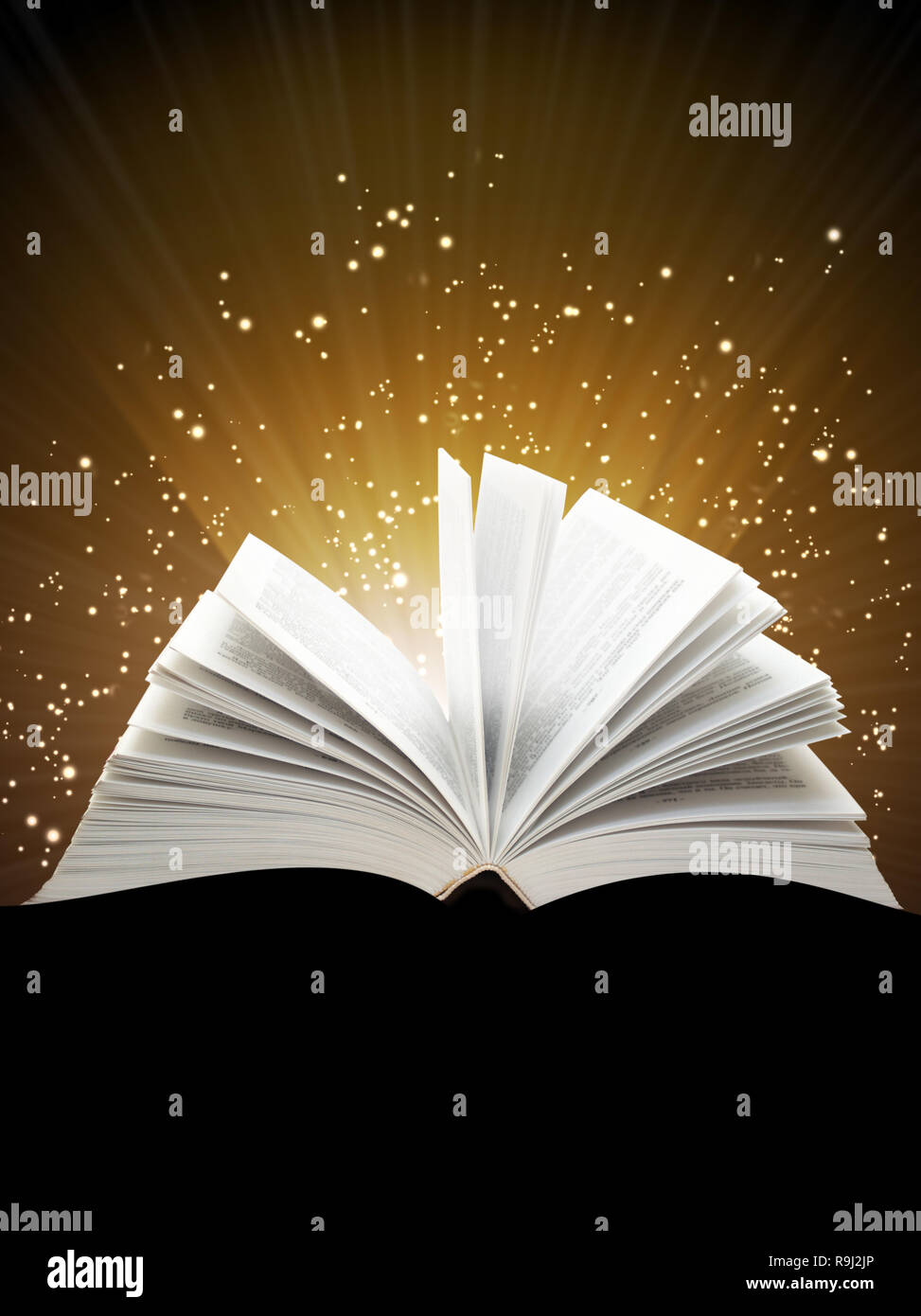 Border with magic book. On black background Stock Photo - Alamy