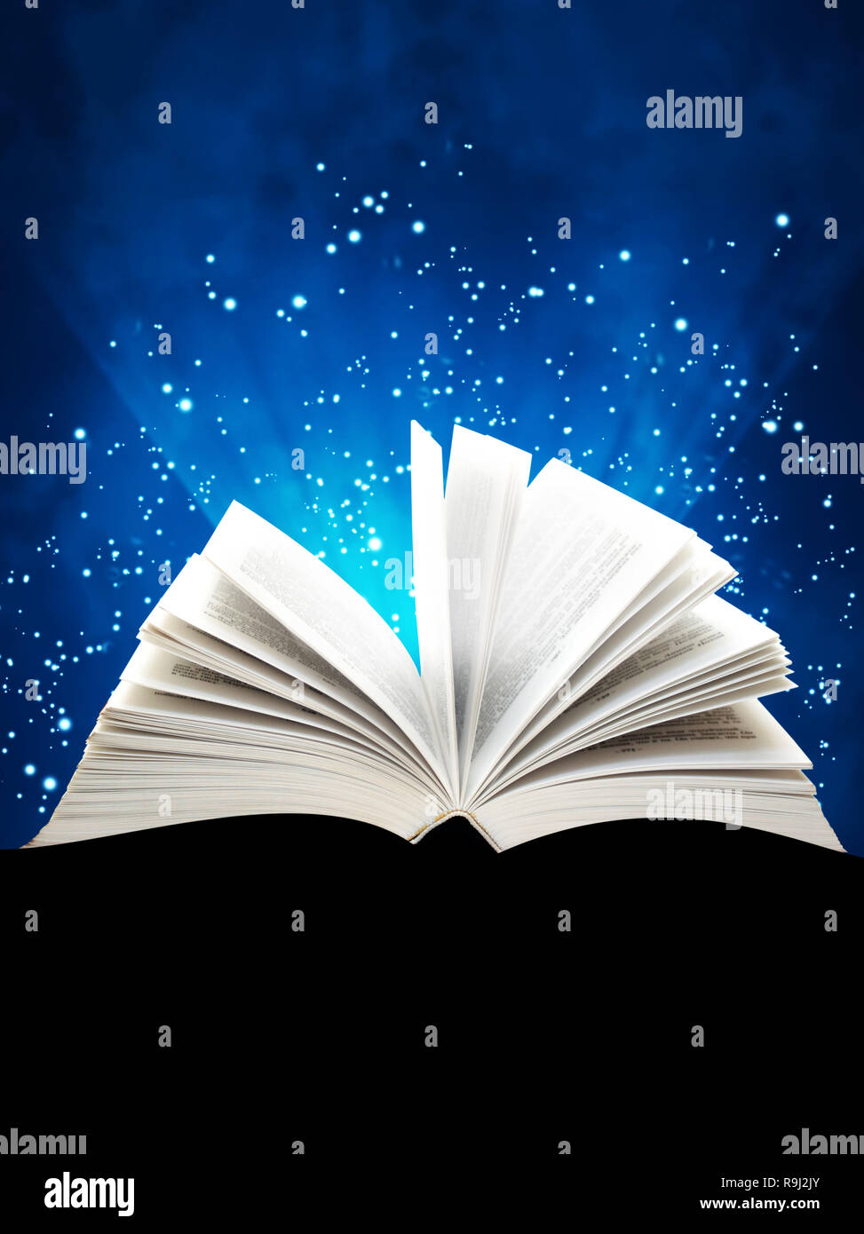 Border with magic book. On blue background Stock Photo - Alamy