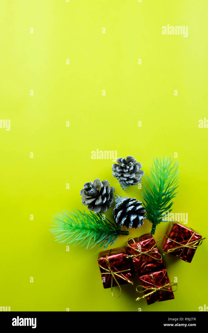 Christmas Decorations on yellow art paper background and have copy ...