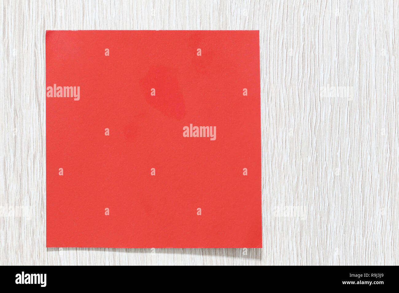 empty red art paper on a white wooden floor for design in Christmas ...