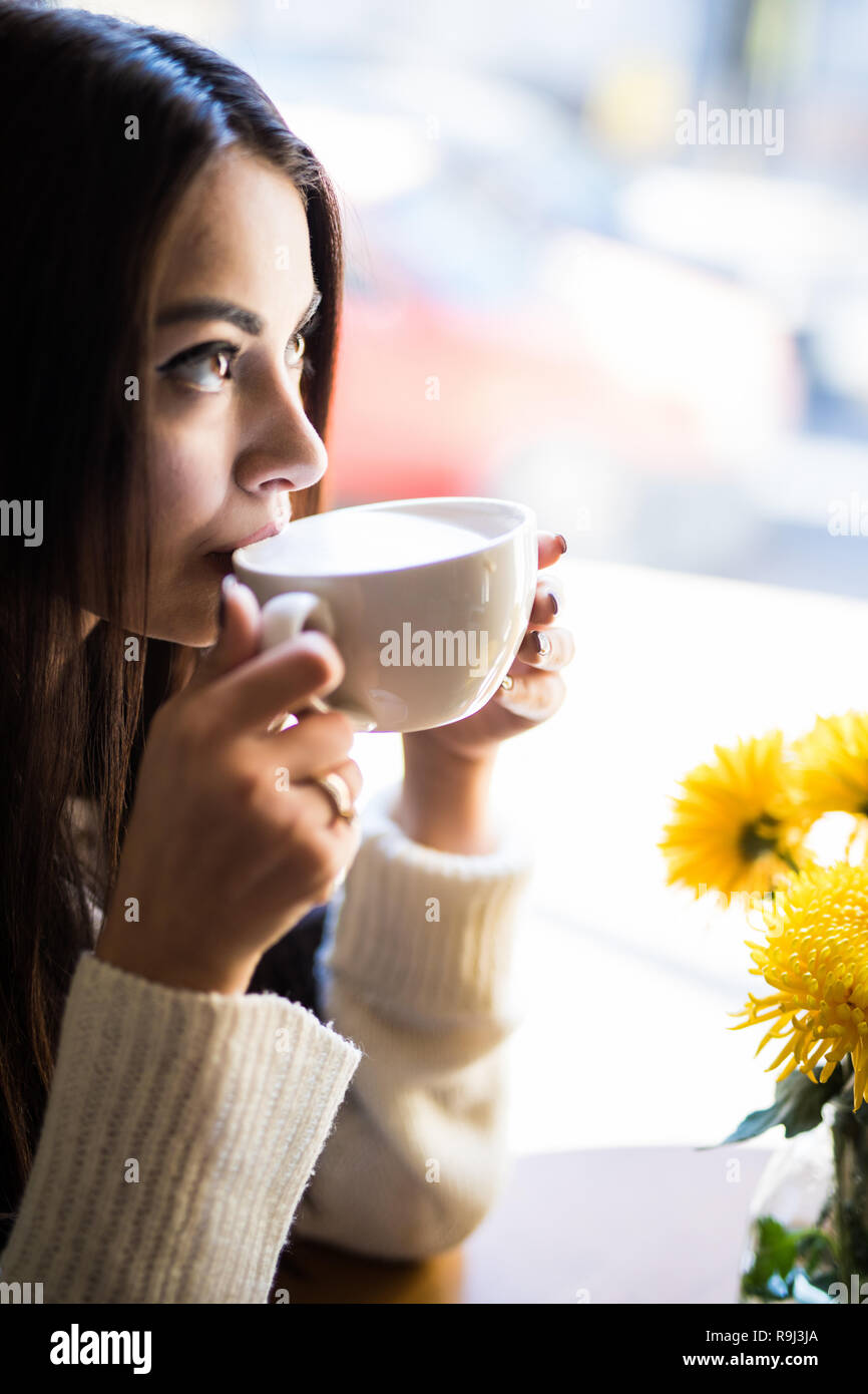 Woman Drinking Coffee