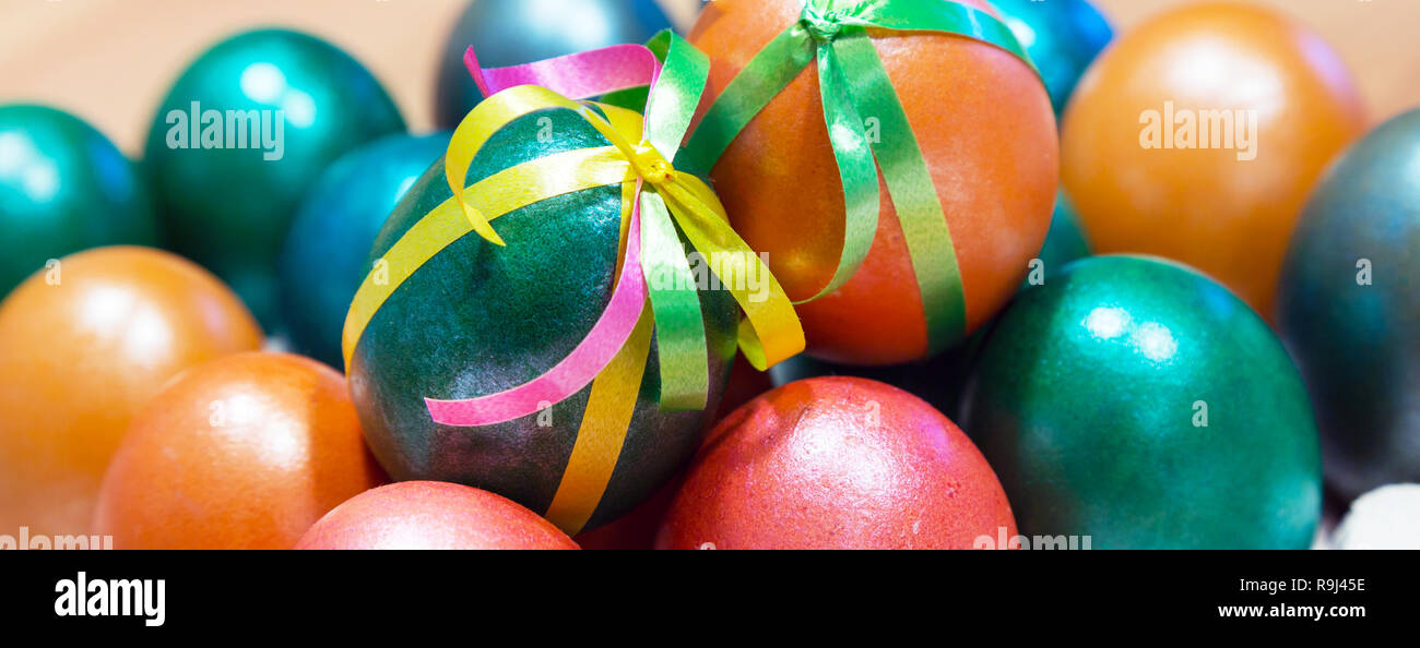 Brightly colored bow decorated easter eggs holiday panoramic banner ...