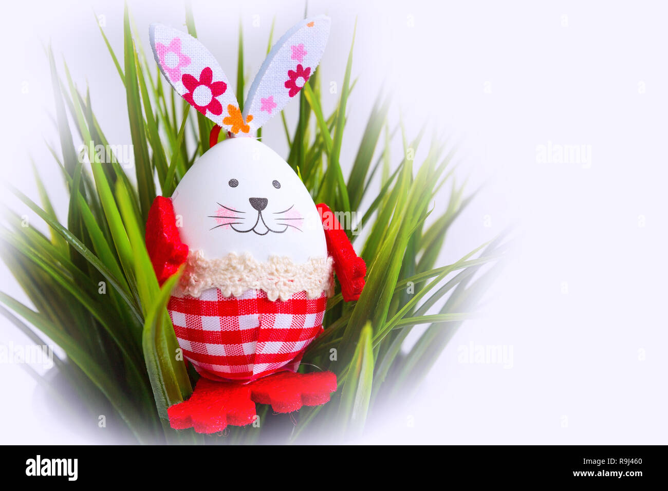 Funny Easter egg bunny rabbit decorations in green grass postcard ...