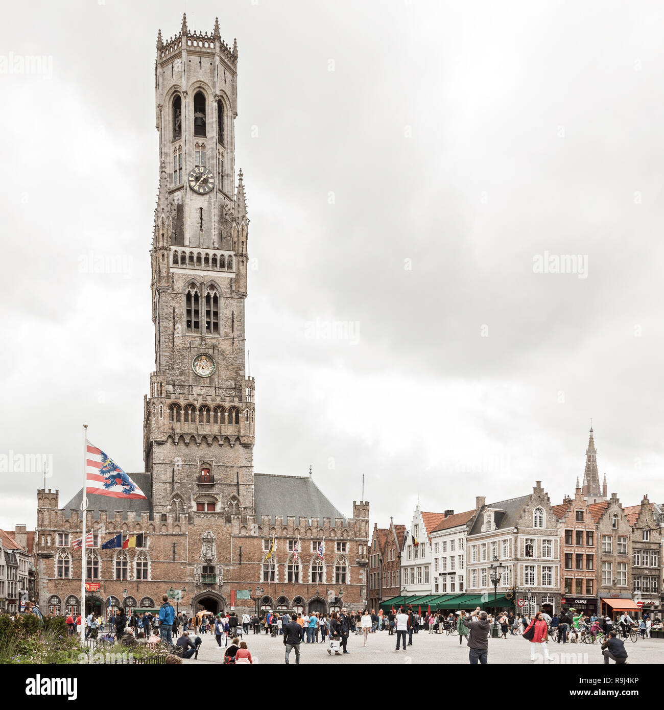 Central market square (Grote markt) and Belfort tower with tourists ...
