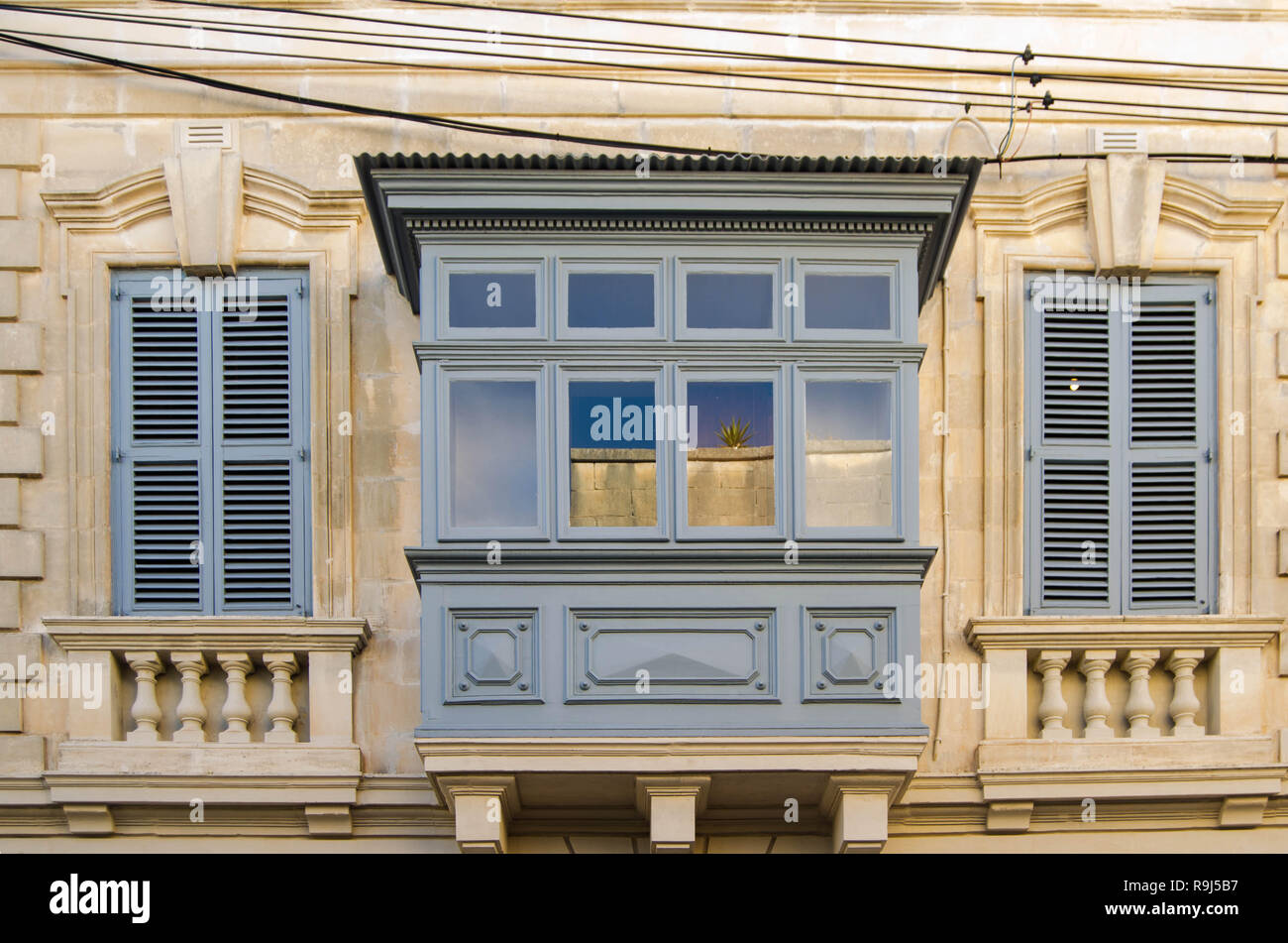 Old building with traditional maltese balcony in historical part of ...