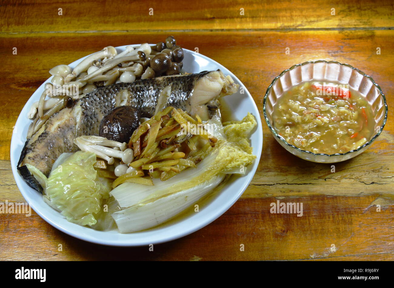 steamed snake head fish with mushroom and slice ginger dipping spicy ...