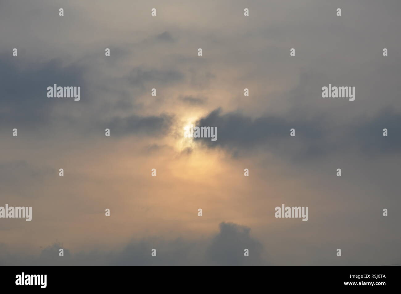 sunlight in dusky sky on raining season Stock Photo - Alamy